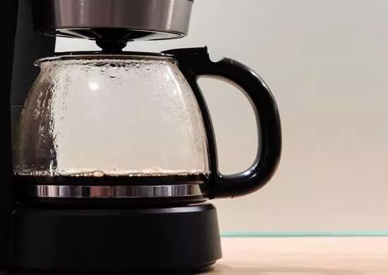 Neteja el dipòsit de cafè