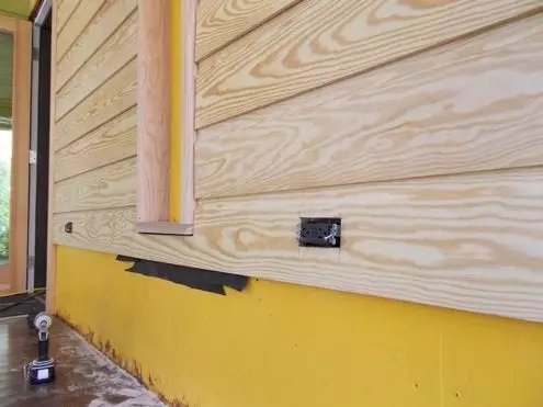 RenovationRoadTrip-86nit-Cutting-outlet-openings-in-sided-BobVila-Photo15