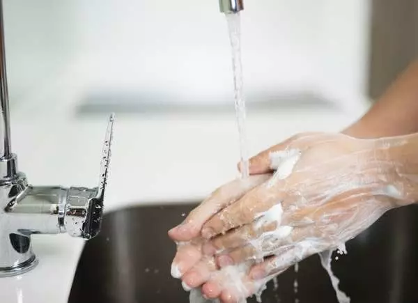 Covid onroerend goed handen wassen